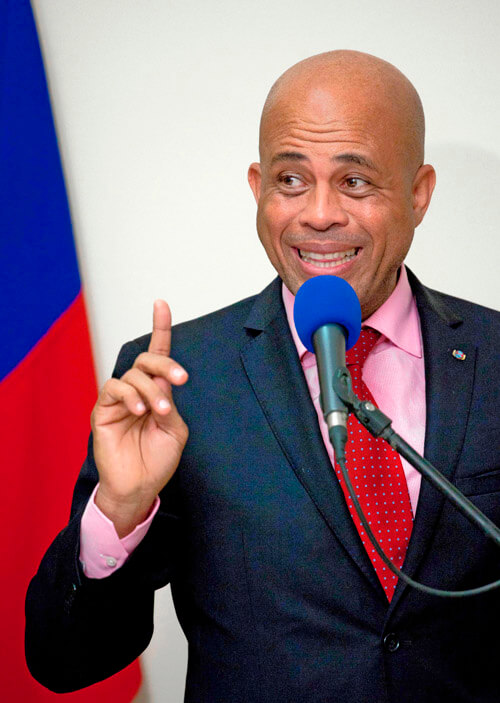 MICHEL ADMITS ERRORS – Caribbean Life