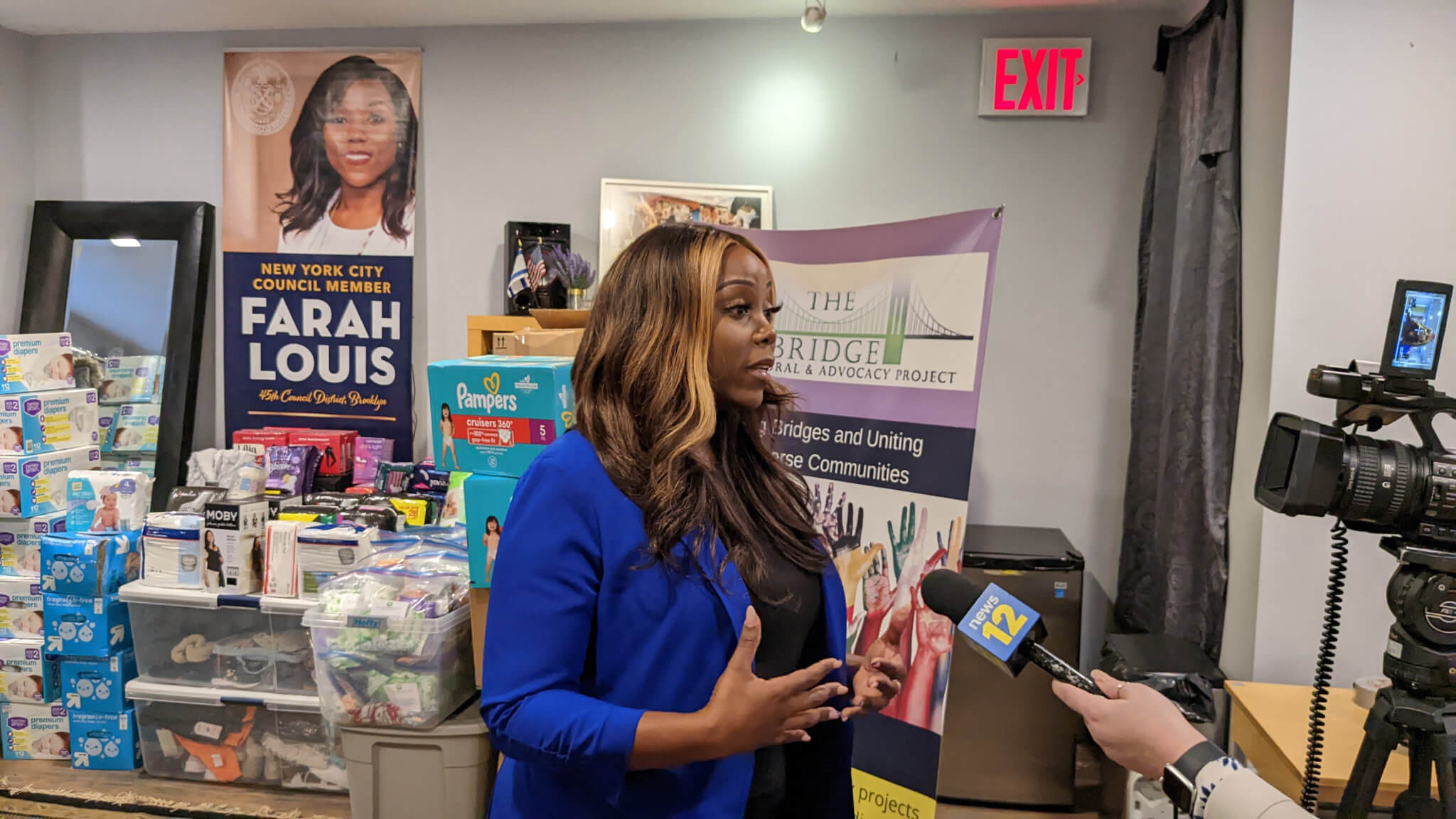 Louis distributes winter coats to asylum seekers in East Flatbush ...