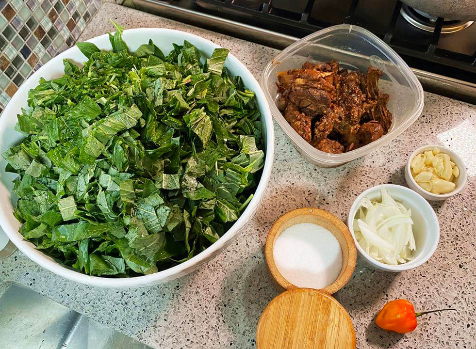 Chorai Bhagi (Jamaican Callaloo) with Stewed Chicken – Caribbean Life
