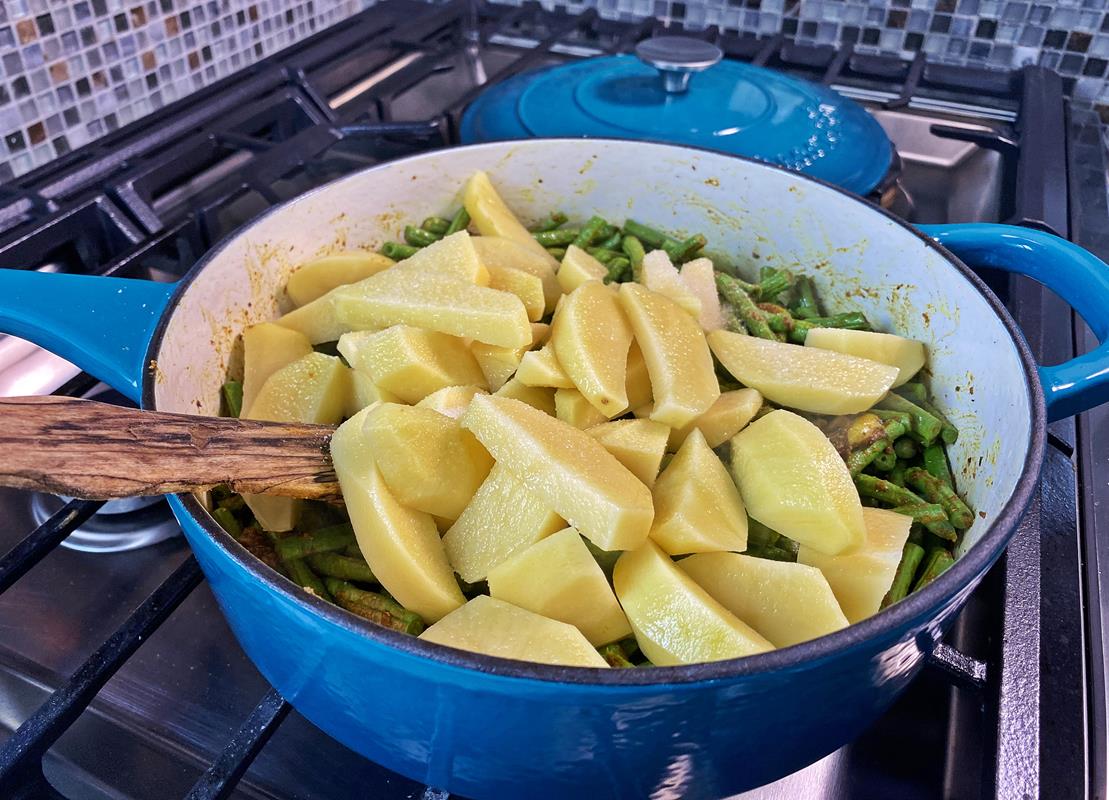 Curry Bodi With Potatoes – Caribbean Life