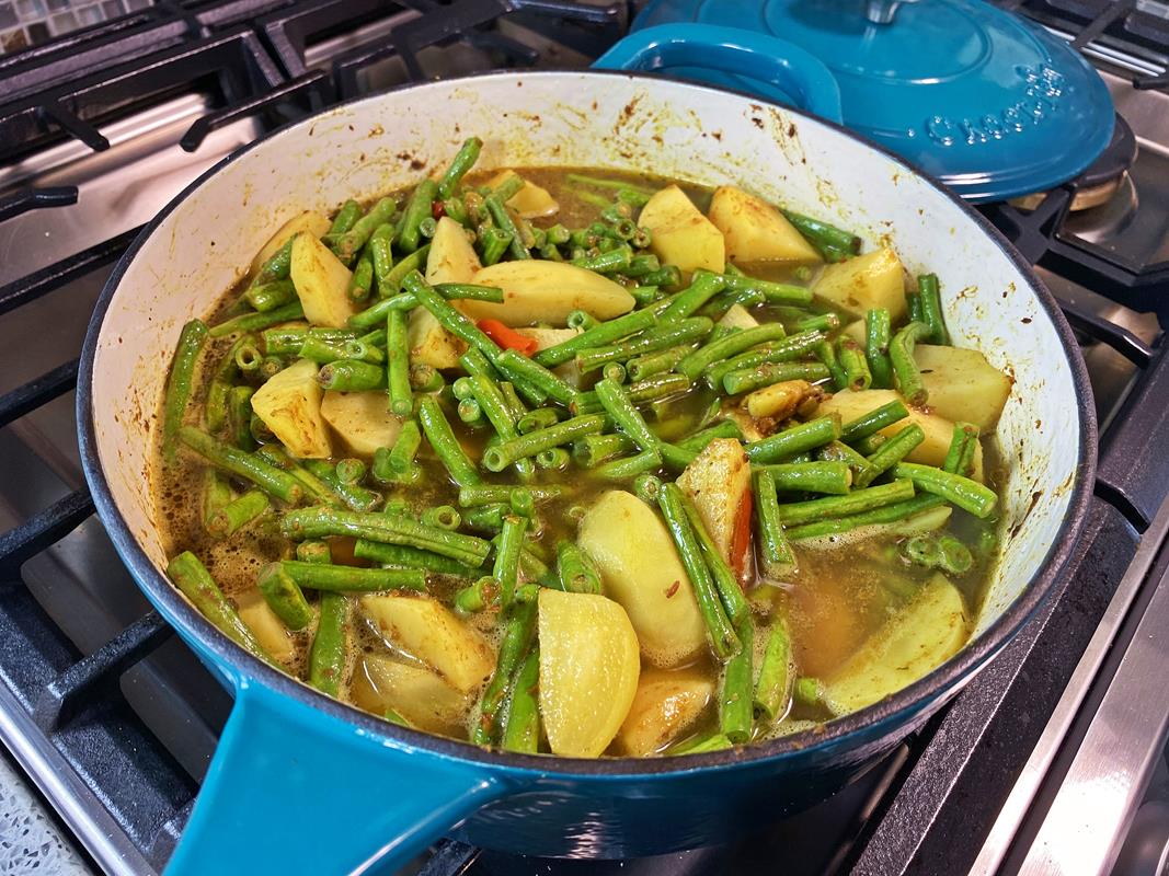 Curry Bodi With Potatoes – Caribbean Life