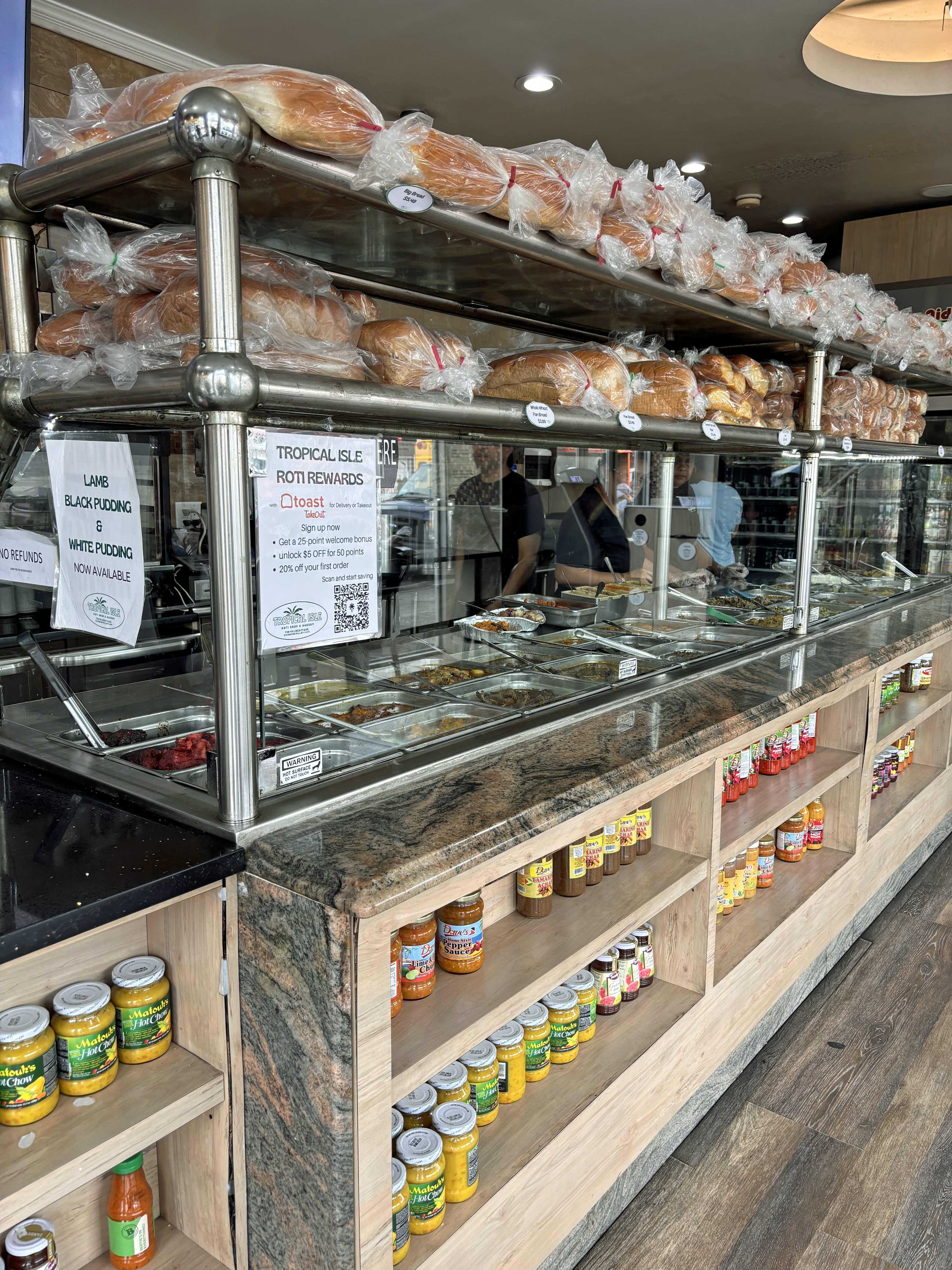 Tropical Isle Roti Shop: A culinary gem in the heart of Little Guyana ...